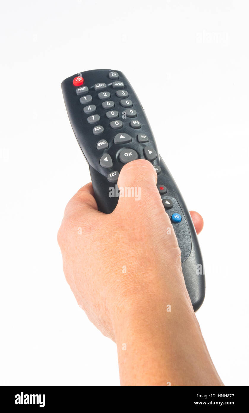 hand holding a remote control on white background Stock Photo - Alamy