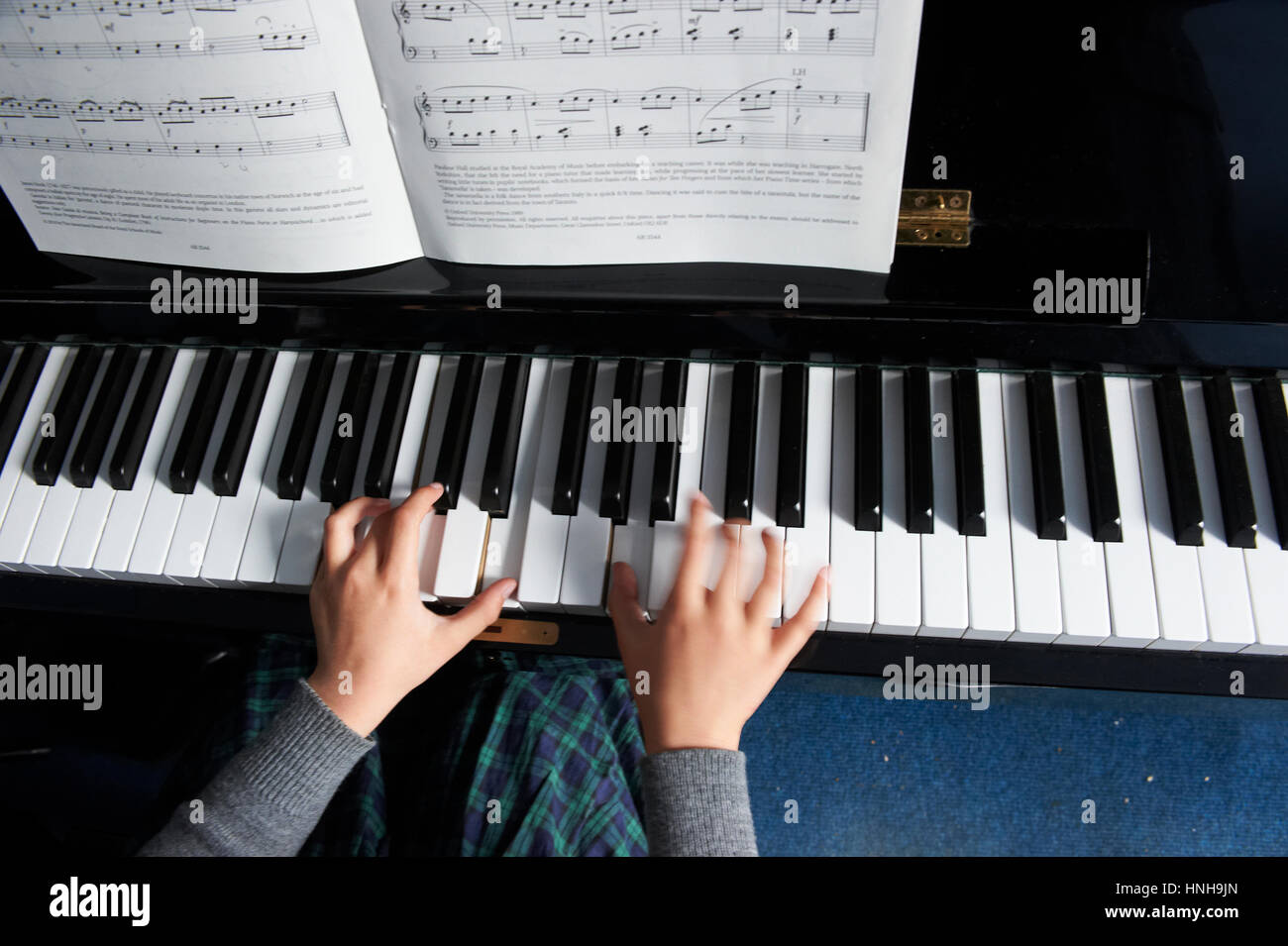 playing piano in school Stock Photo - Alamy