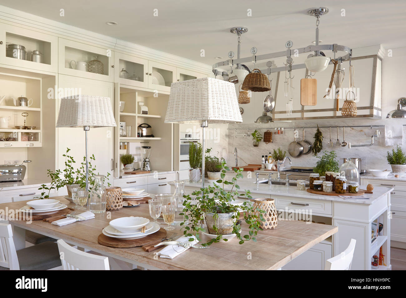 Decorated kitchen interior with furniture and equipment. Natural light ...