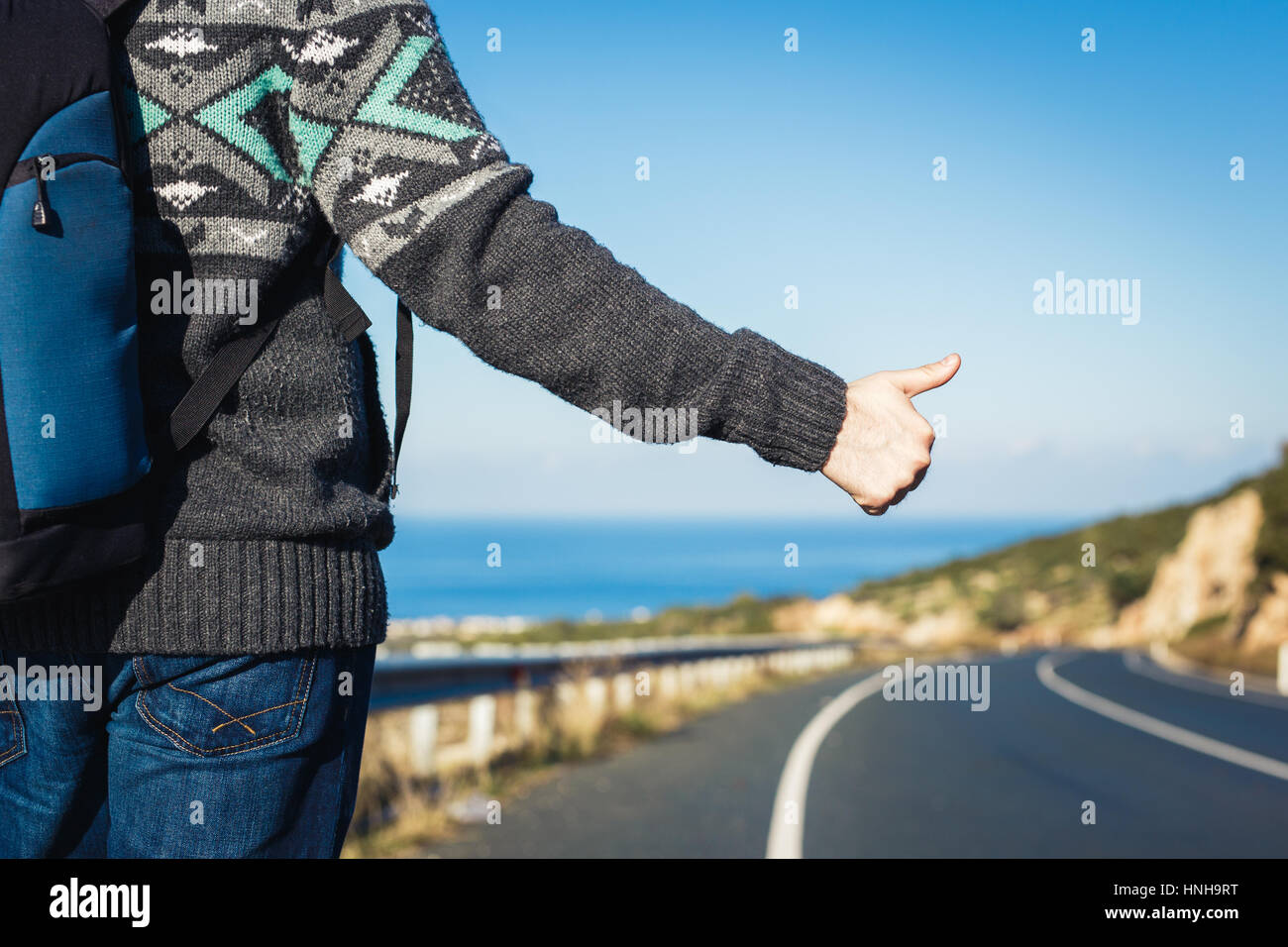 road trip, travel, gesture and people concept - hitchhiker stopping car ...