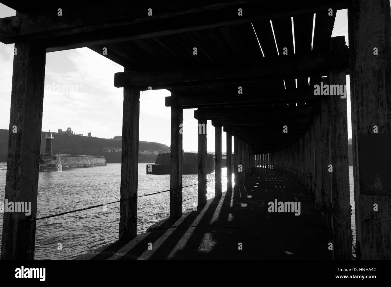 Under the North pier at Whitby Stock Photo - Alamy