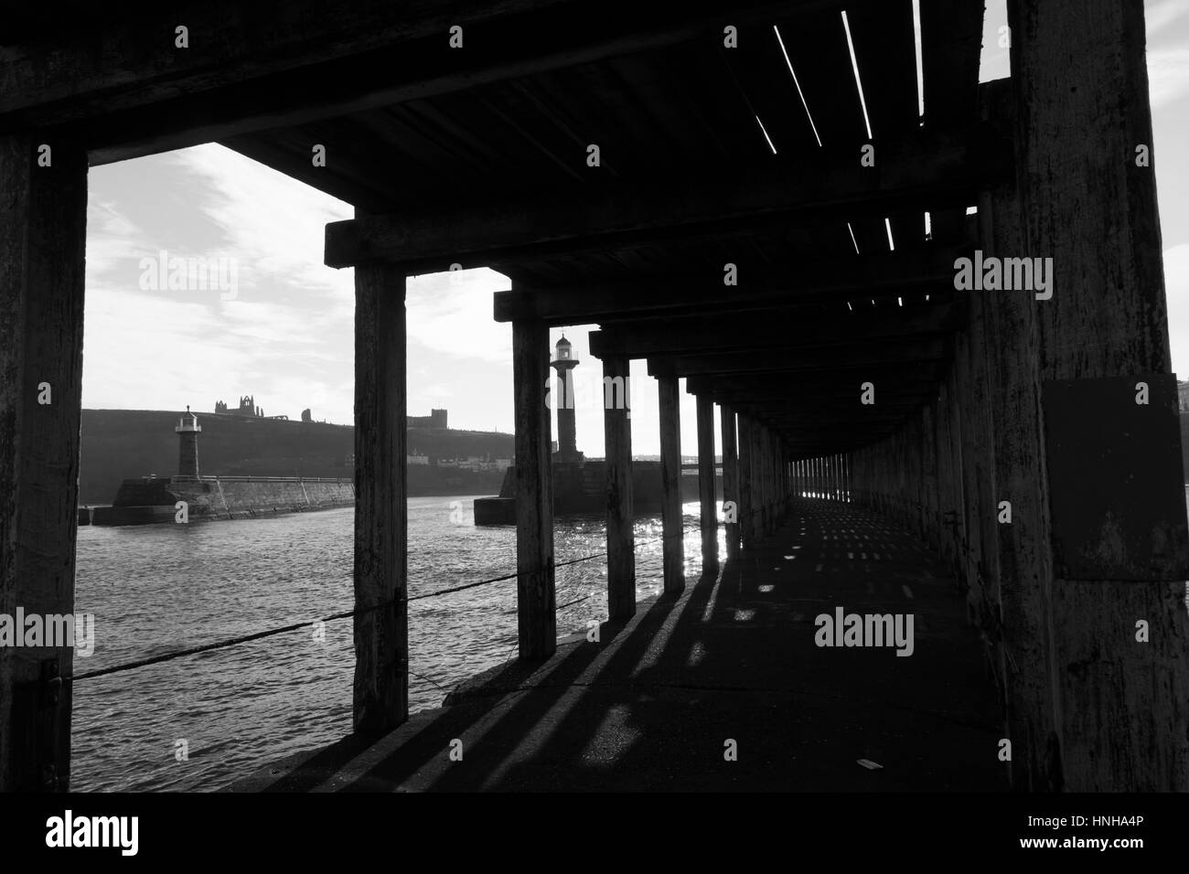 Under the North pier at Whitby Stock Photo - Alamy