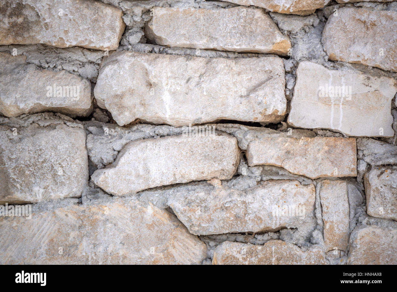 Closeup of white rough actique stone wall Stock Photo - Alamy
