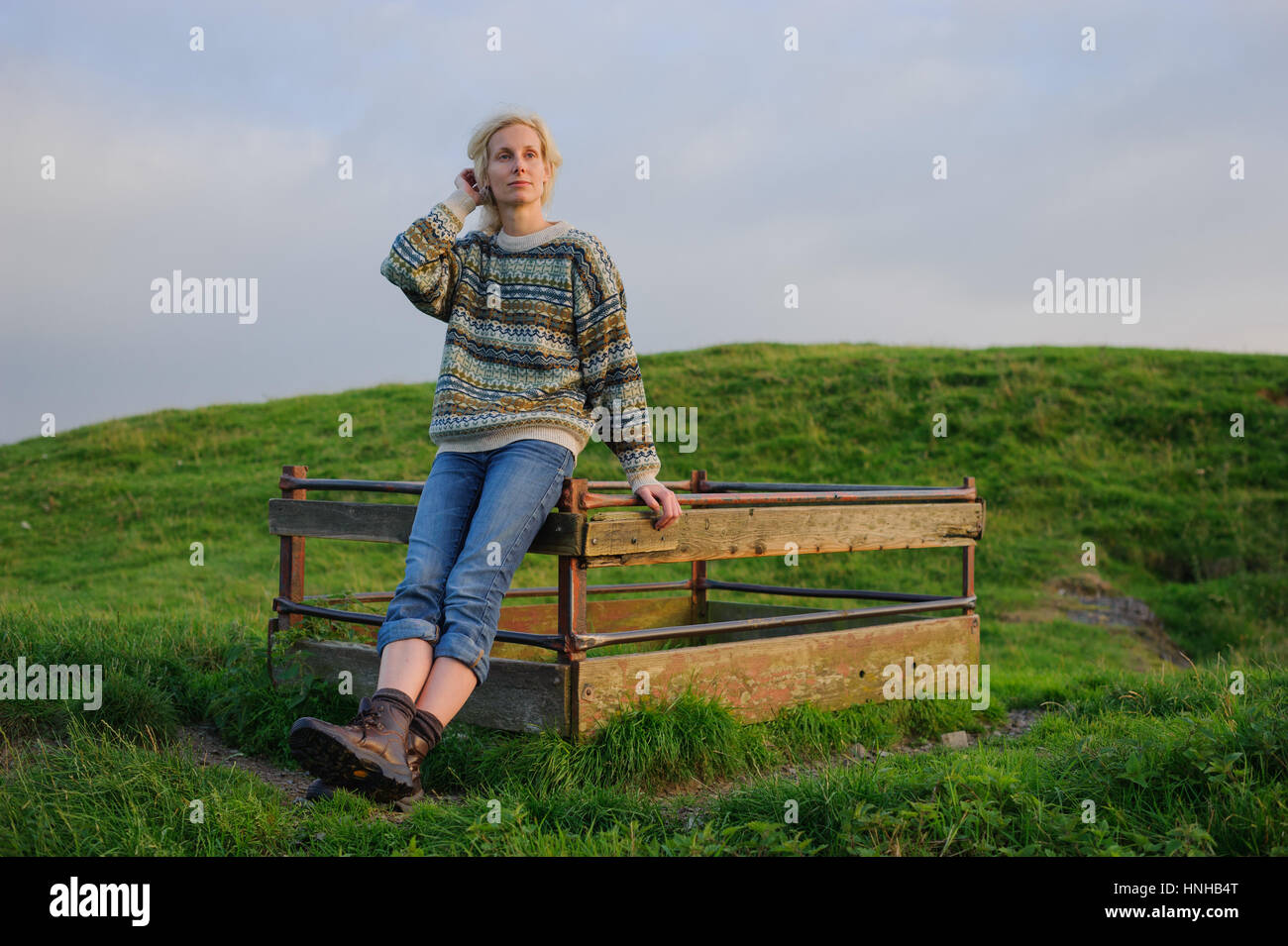 Woman in the countryside Stock Photo - Alamy