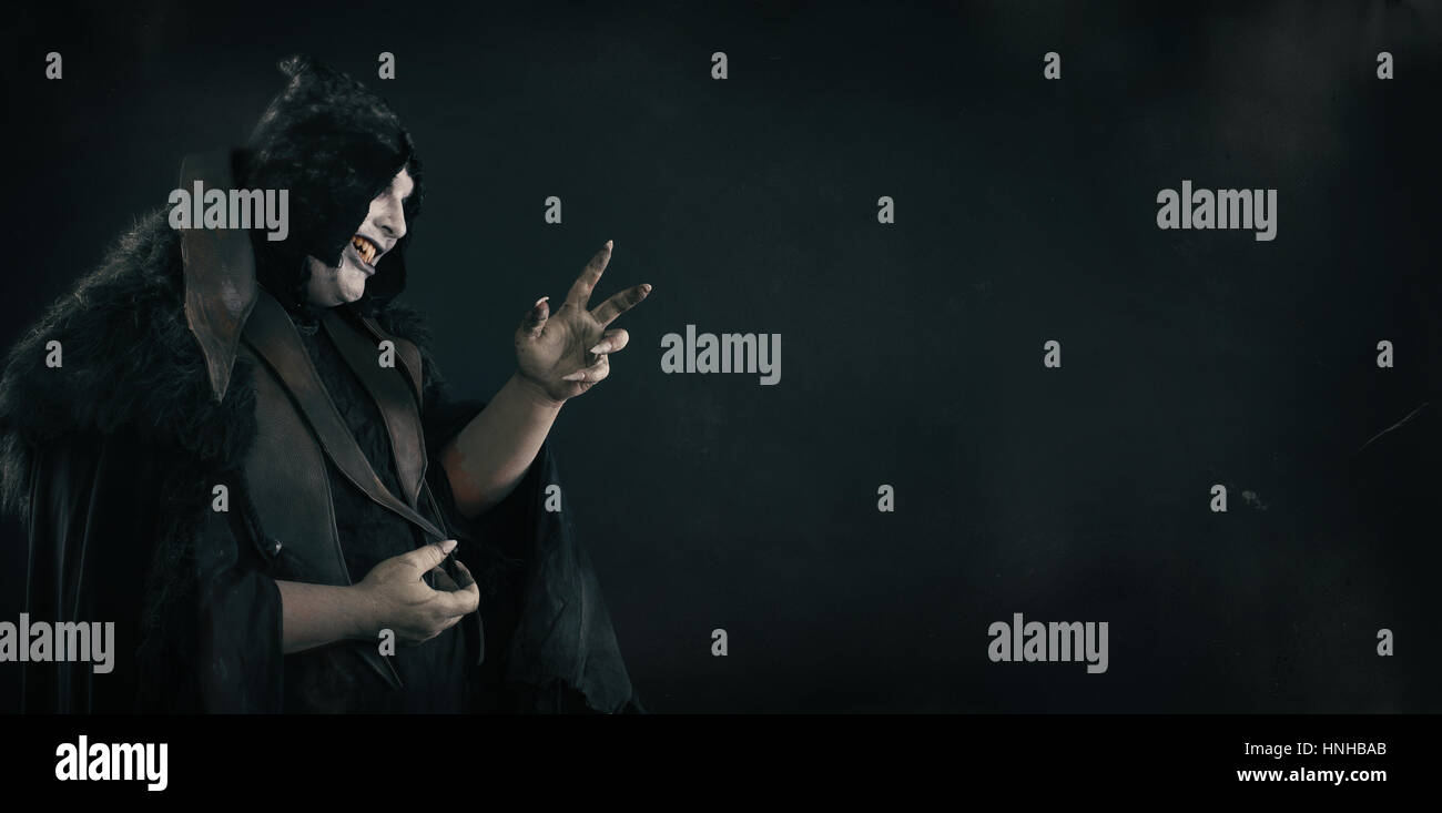 Happy crazy smiling nightmare vampire with large scary nails. Undead ...