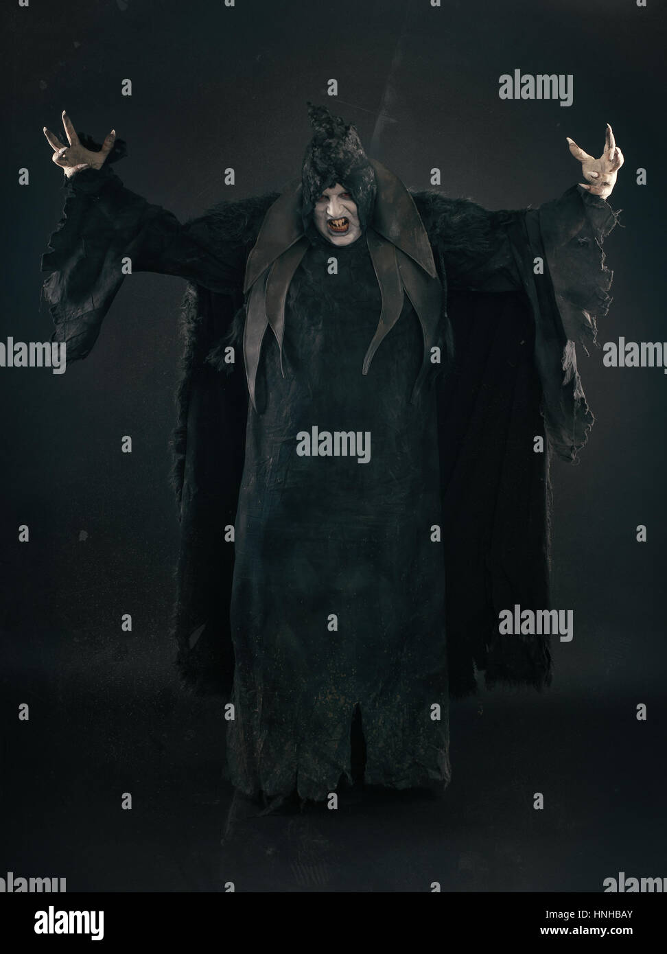 Spooky undead devil vamp with large scary nails. Hell and horror ...