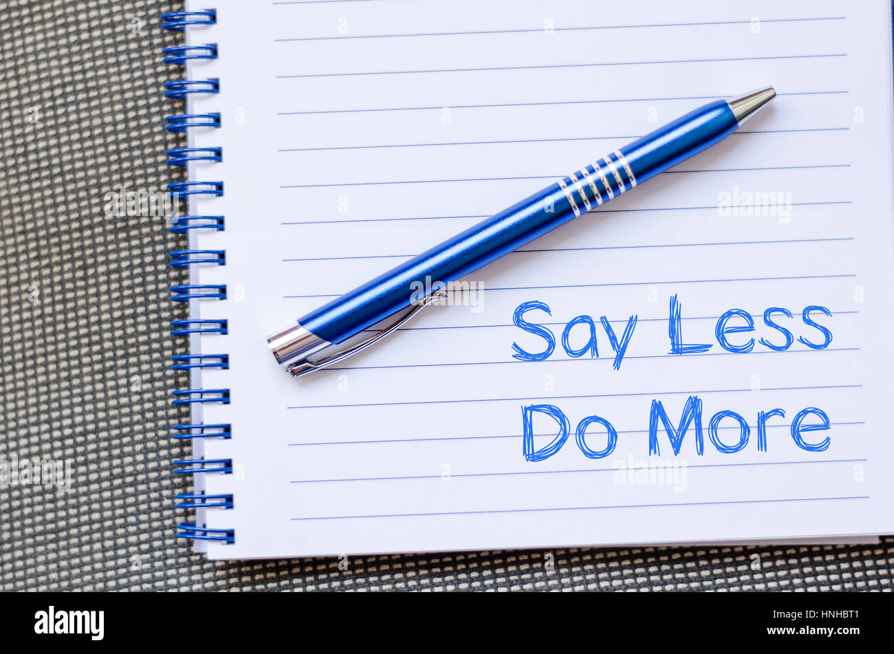 Say less do more text concept write on notebook Stock Photo - Alamy