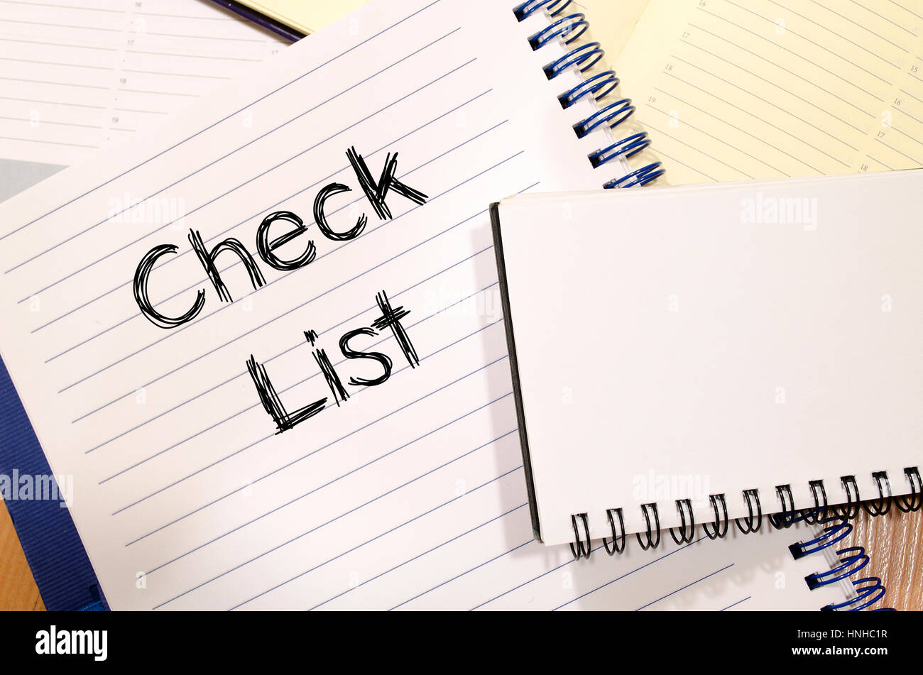Check list text concept write on notebook Stock Photo - Alamy