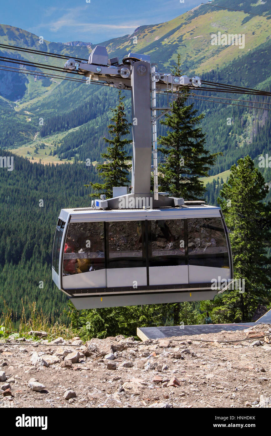 Cable car in the mountains, wagon with tourists Stock Photo - Alamy