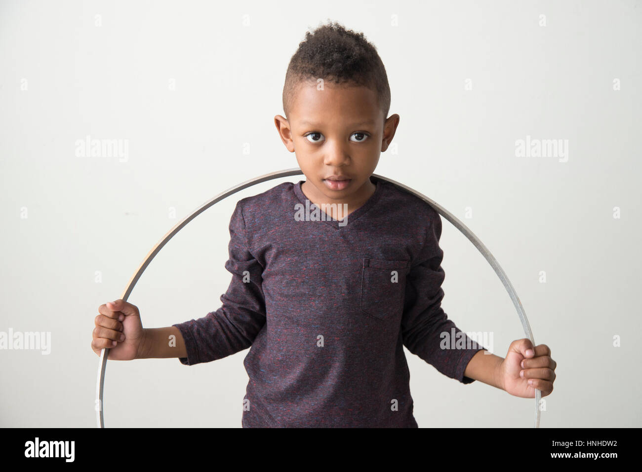 boy holding hoop Stock Photo - Alamy