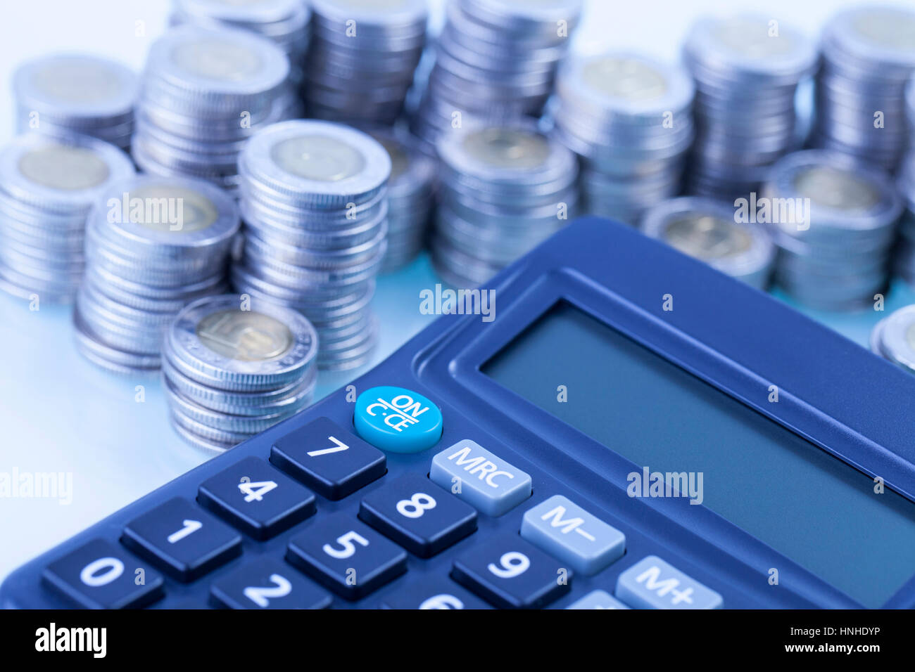 Financial theme on white background. Studio shot Stock Photo - Alamy