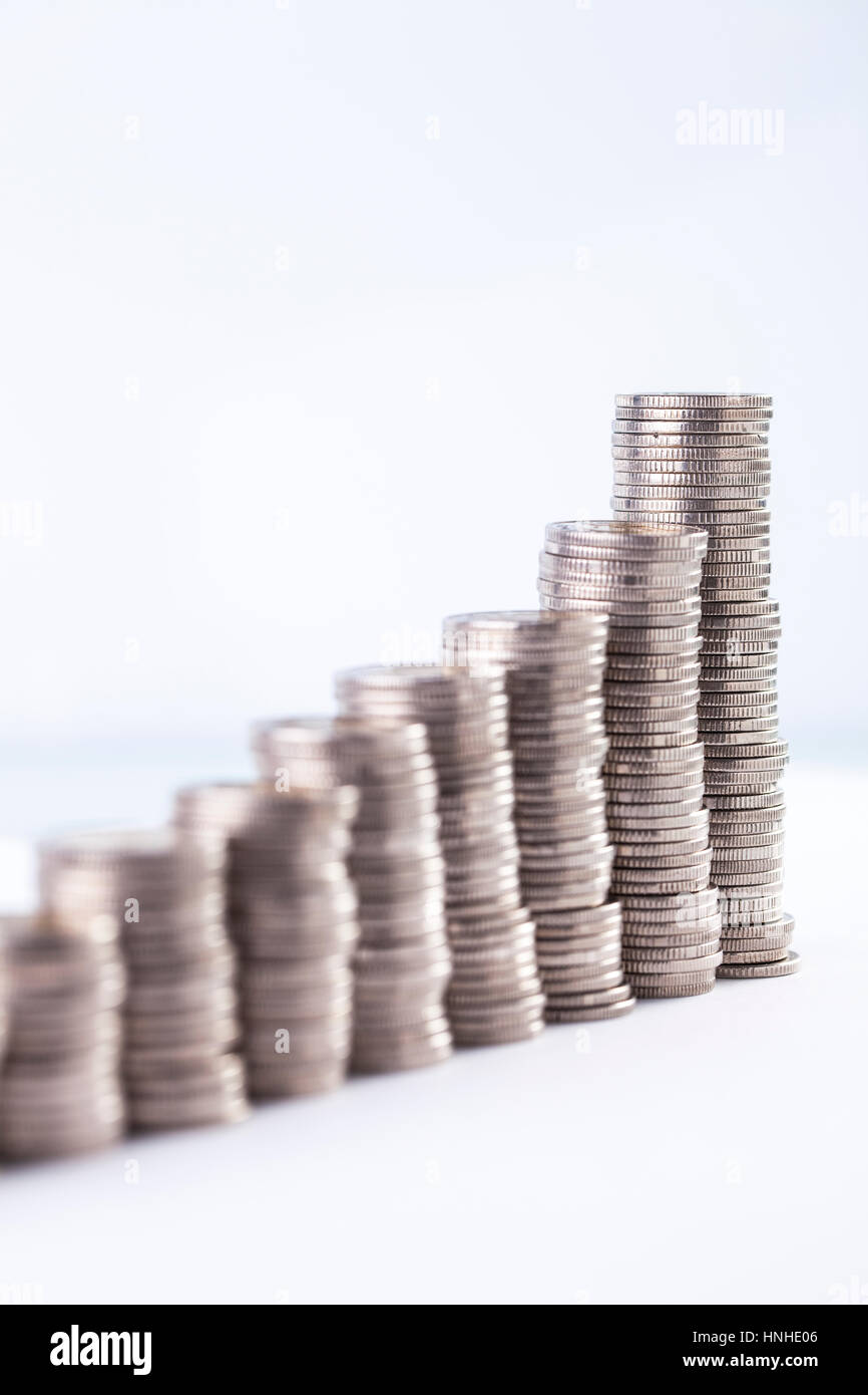 Financial theme on white background. Studio shot Stock Photo - Alamy