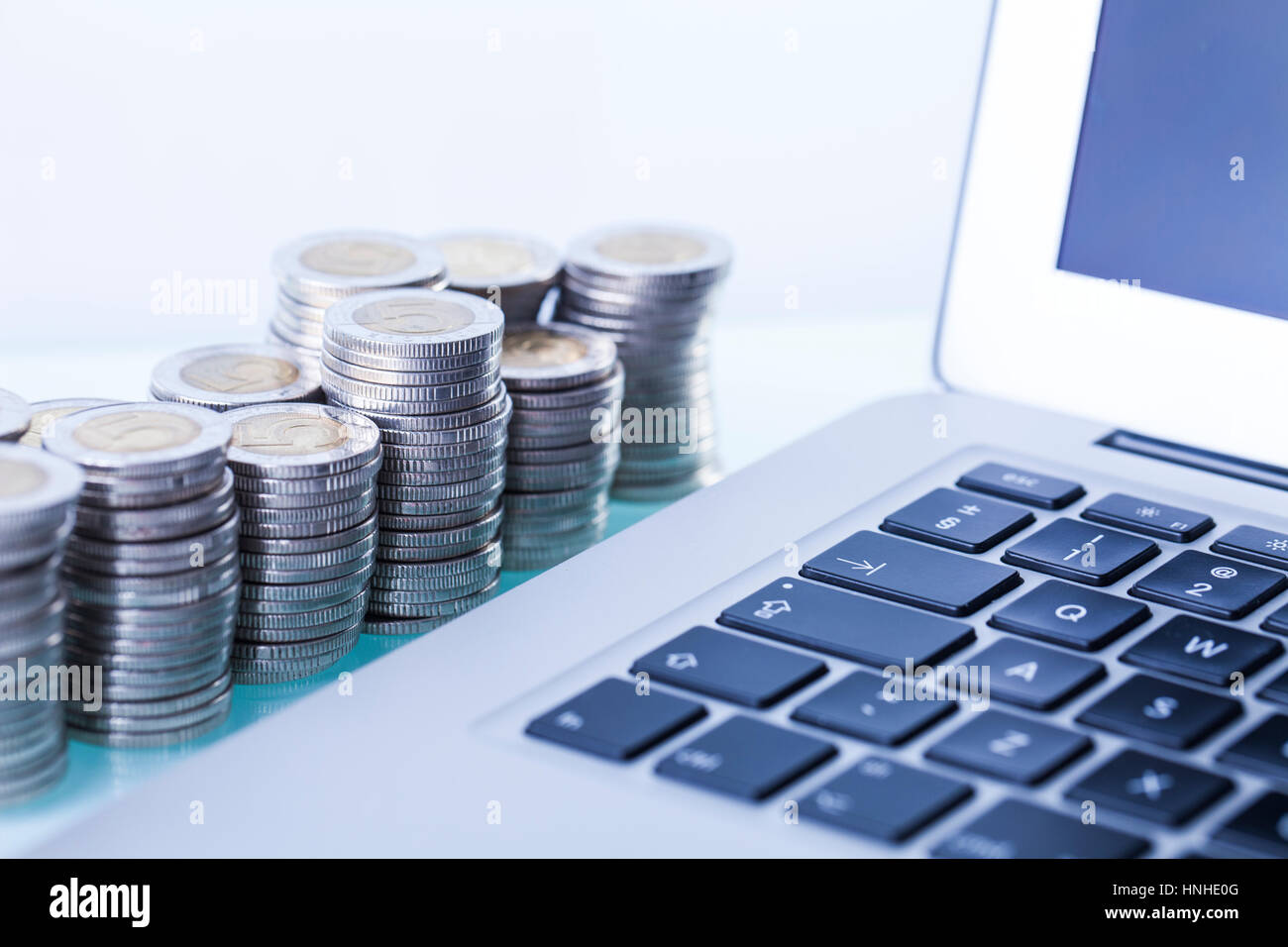 Financial theme on white background. Studio shot Stock Photo - Alamy