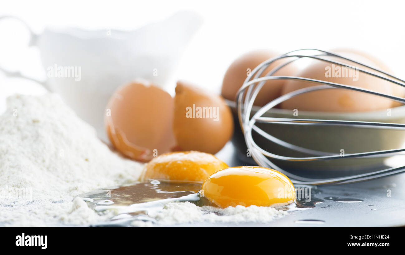 Batter mix of eggs,flour and milk for pancakes, Yorkshire pudding,and ...