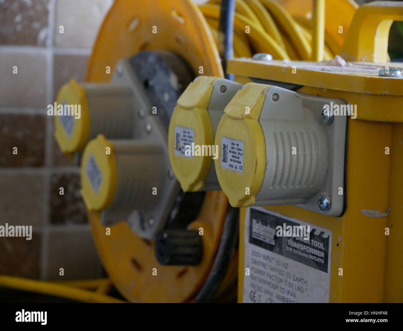 A portable transformer and reel with 2 output sockets capable of ...