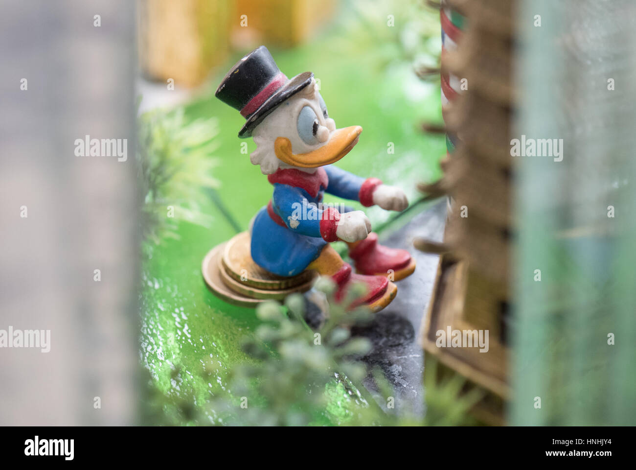 Frankfurt, Germany. 13th Feb, 2017. Dagobert Duck sits among the bank ...