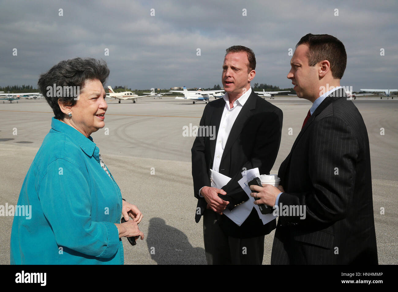 Florida, USA. 13th Feb, 2017. Jonathan Miller (center), President of ...