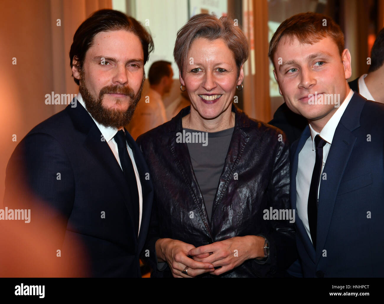 Berlin, Germany. 13th Feb, 2017. Actors Daniel Bruehl (l-r), Birgit Kohler and Max Riemelt ...