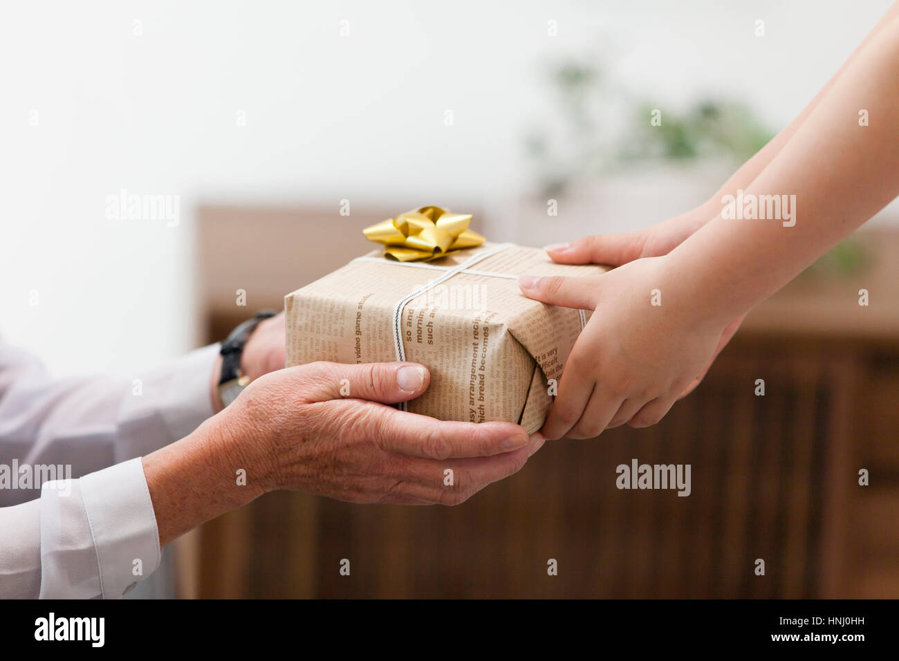 A girl giving her present Stock Photo - Alamy