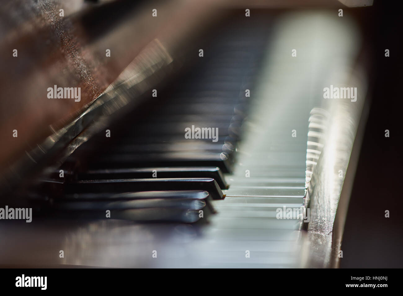 Piano Keyboard backlit in narrow focus and bokeh Stock Photo - Alamy