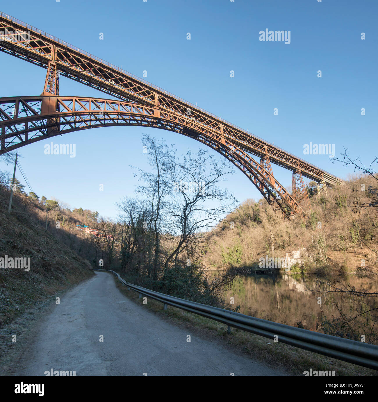 iron frame of bridge over Adda river at Paderno, Italy Stock Photo - Alamy