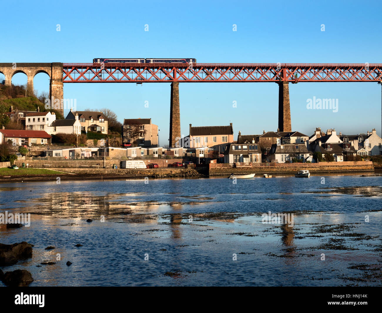 Passenger Train Crossing the Forth Bridge at North Queensferry Fife ...