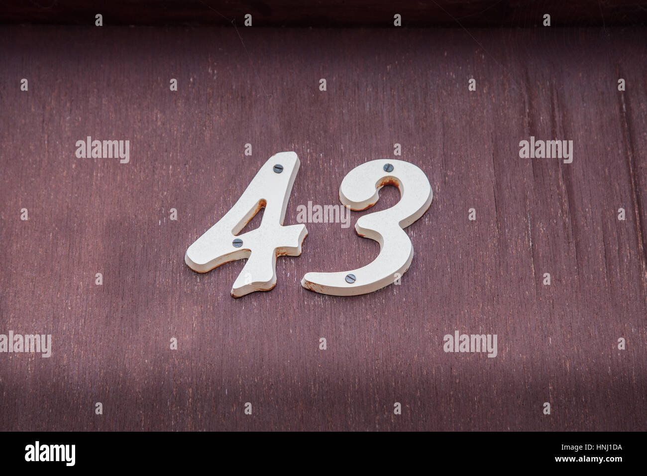 Number 43 on a wooden door Stock Photo - Alamy