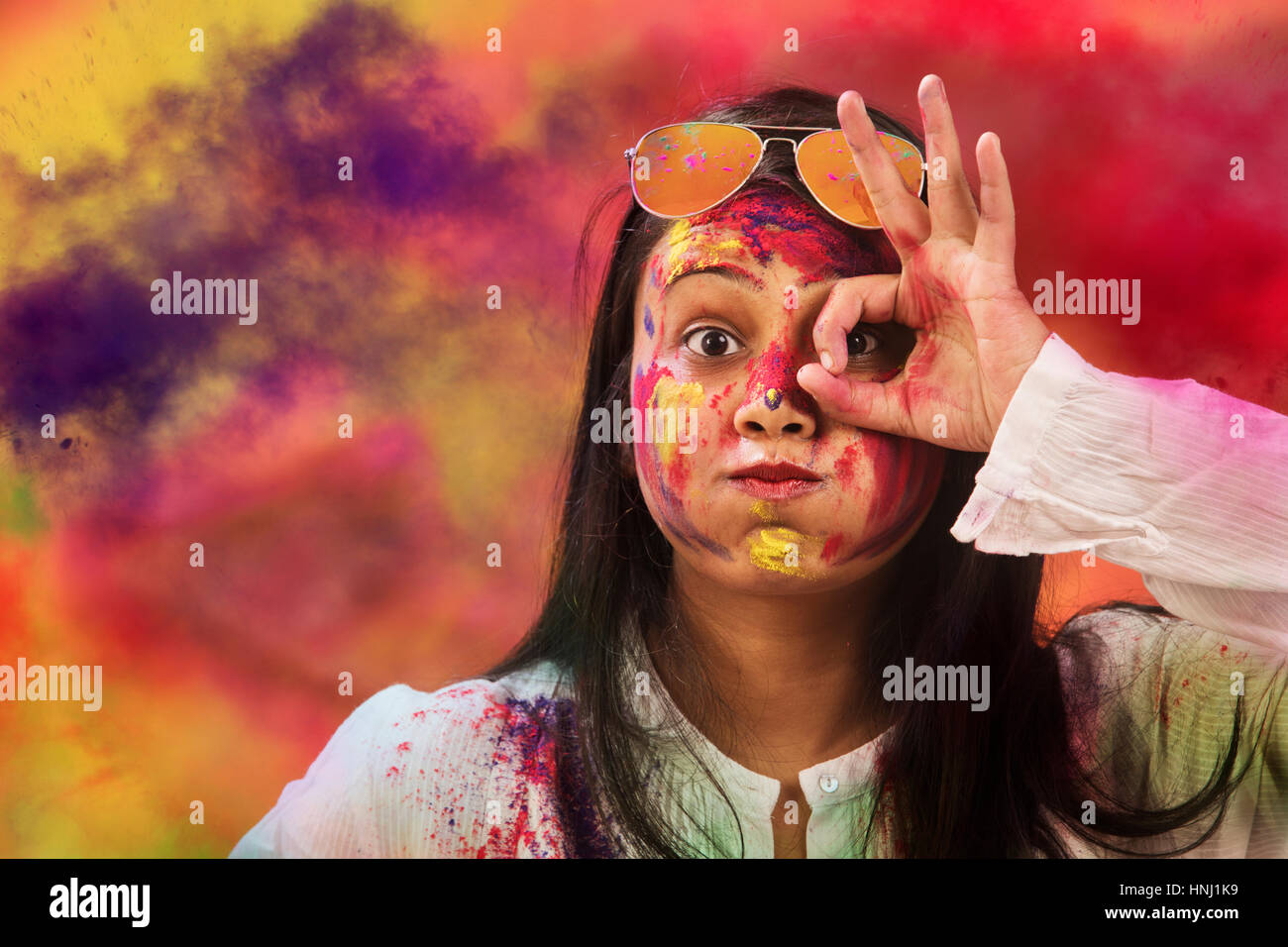 Portrait Of An Indian Girl Having Fun At Holi Color Festival Stock