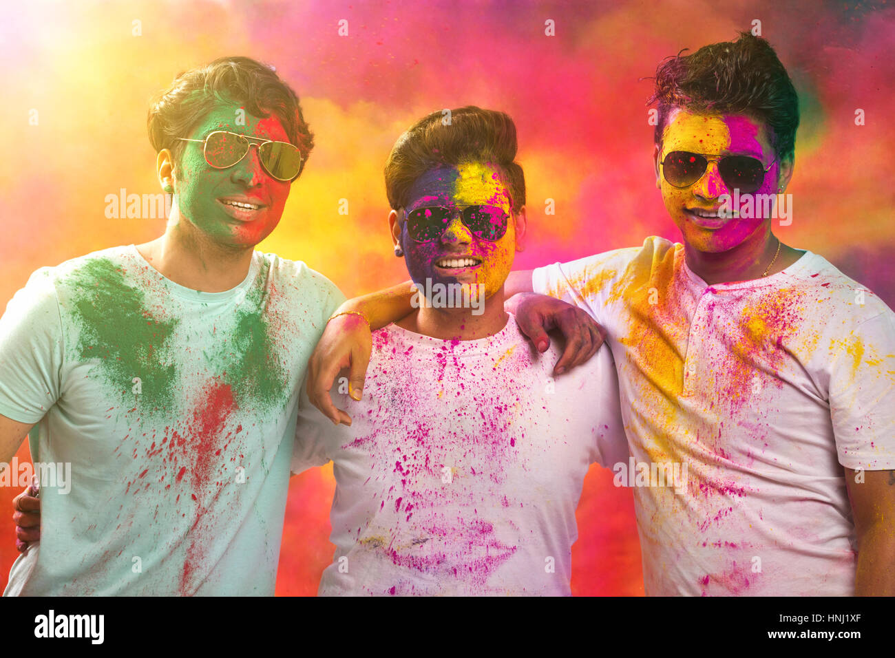 Portrait indian men playing holi hi-res stock photography and images ...