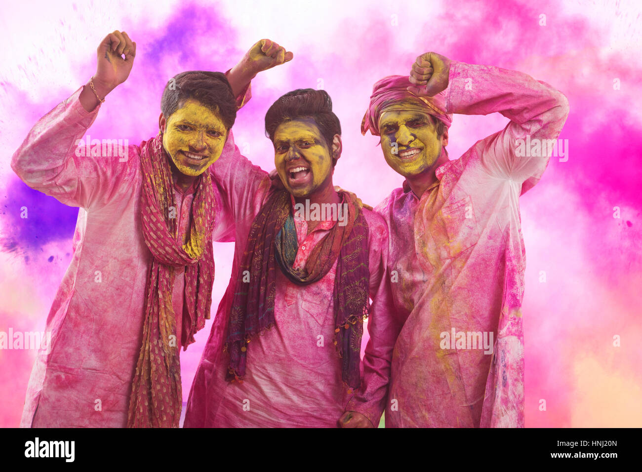 Portrait of Indian men playing holi Stock Photo - Alamy