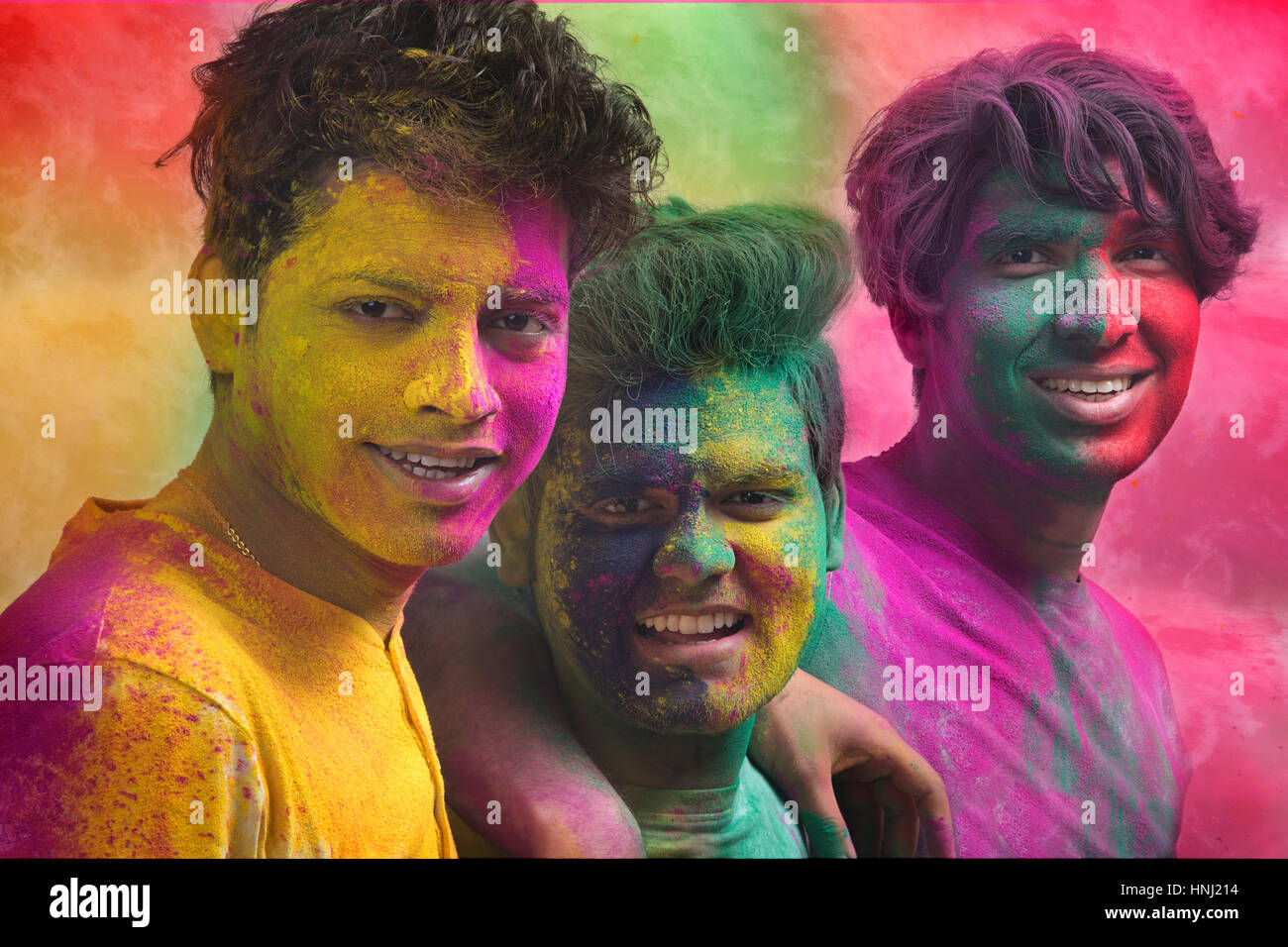Portrait indian men playing holi hi-res stock photography and images ...