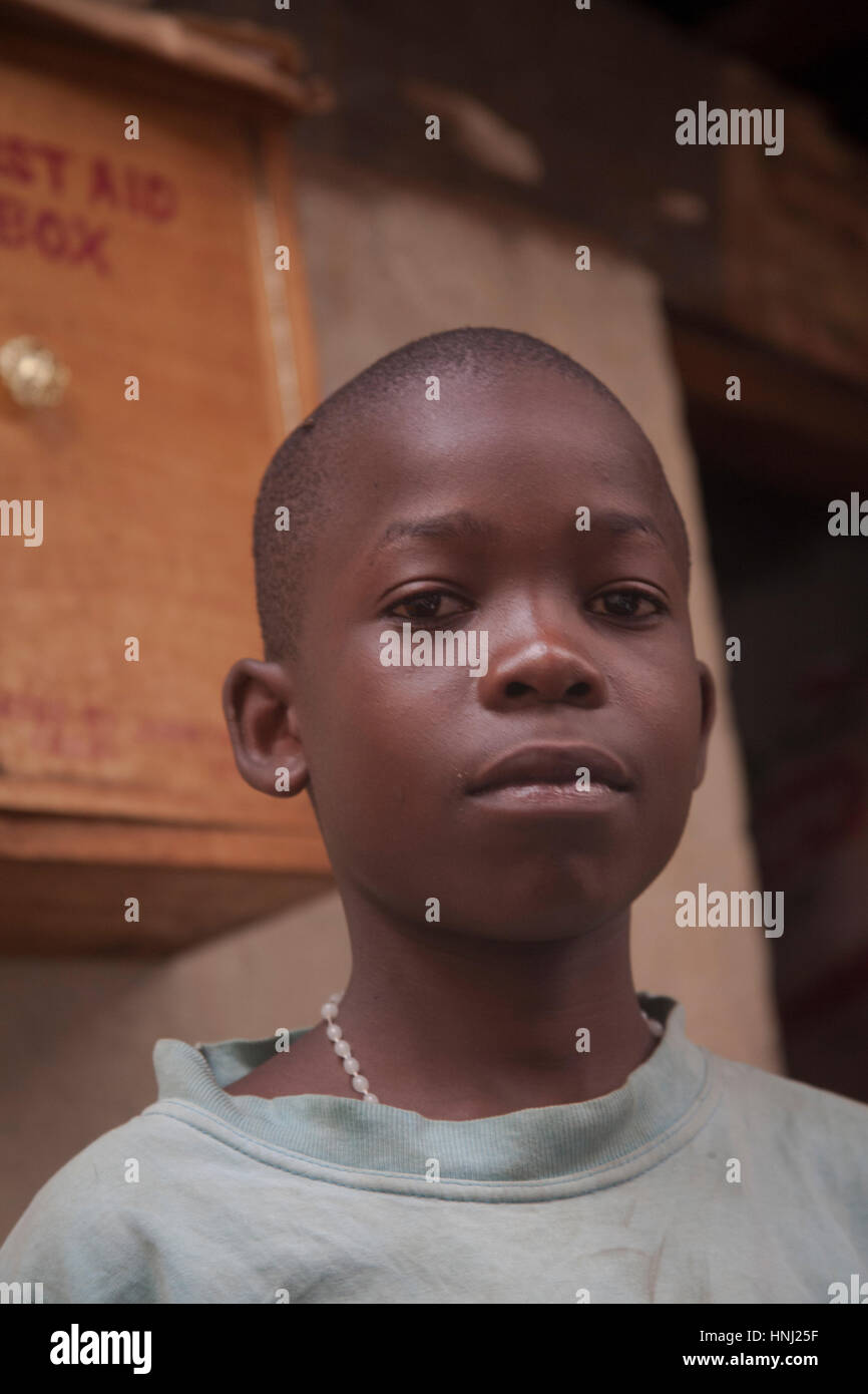 Portrait of a boy in orphanage, Kibera slums, Nairobi, East Africa ...