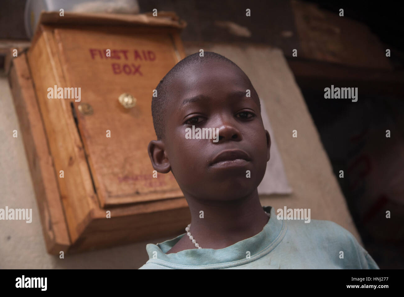 Portrait of a boy in orphanage, Kibera slums, Nairobi, East Africa ...