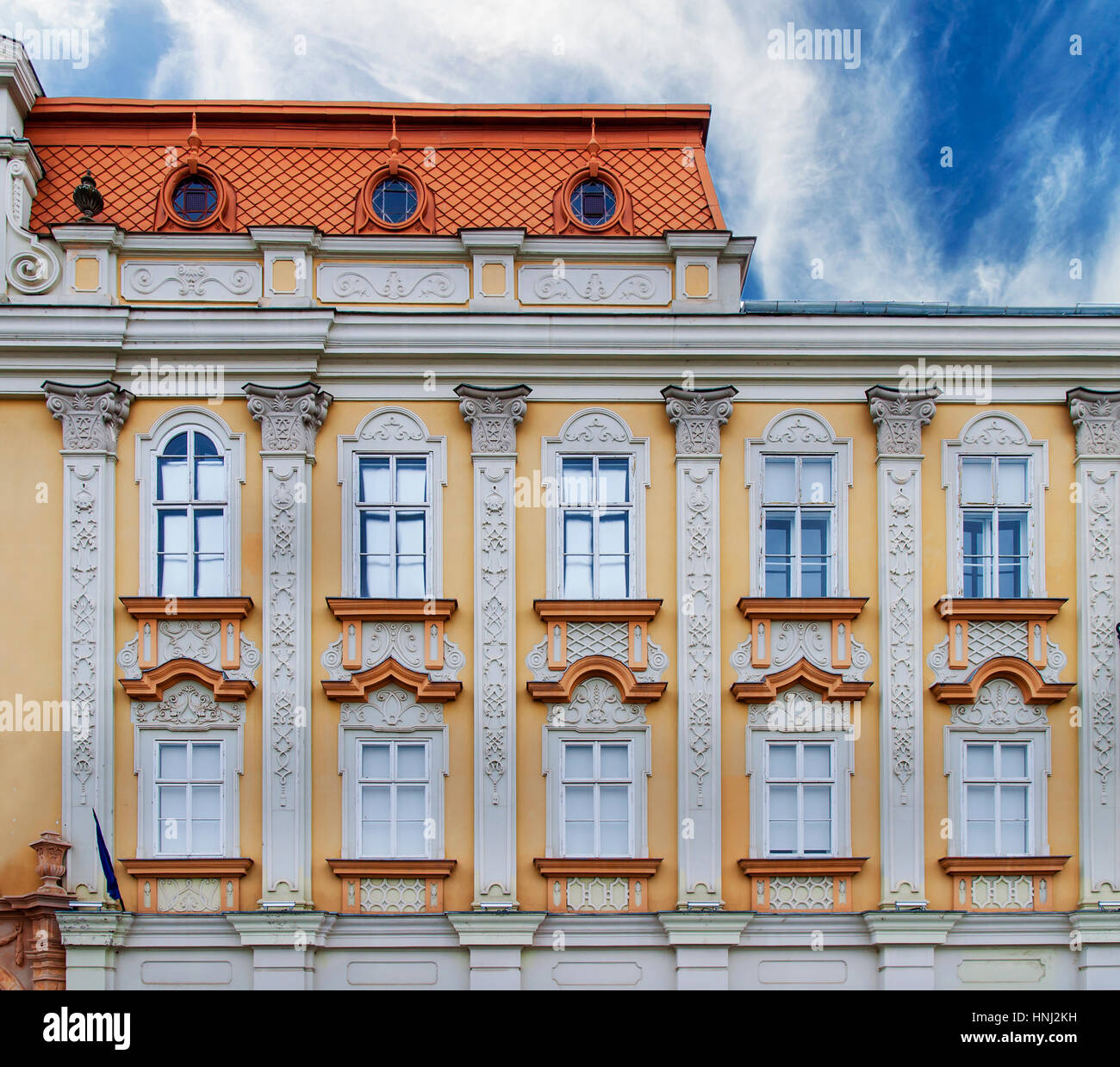Building with windows on sky background Stock Photo - Alamy
