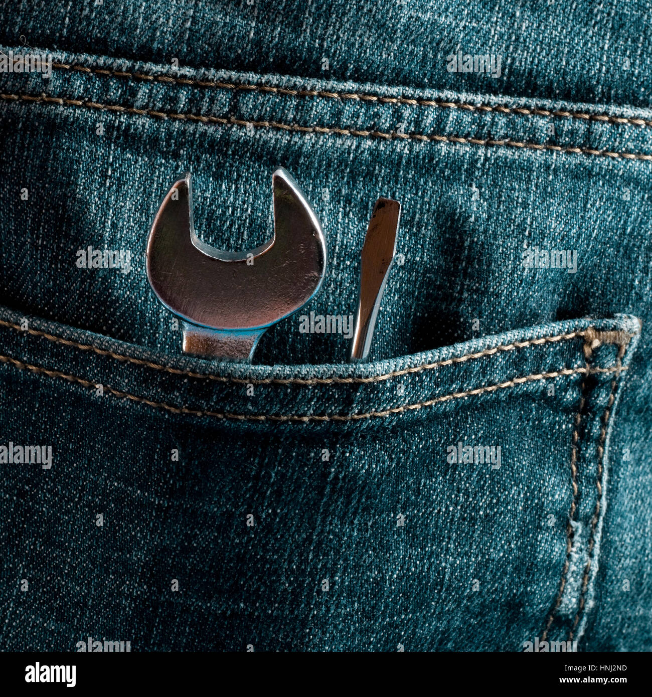tools in the pocket of jeans Stock Photo - Alamy