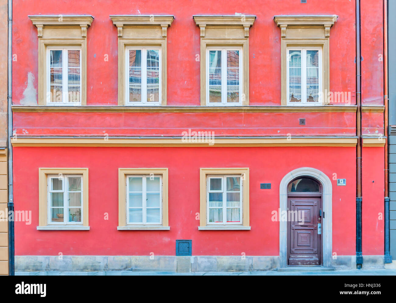 Red building in old town in Warsaw Stock Photo - Alamy
