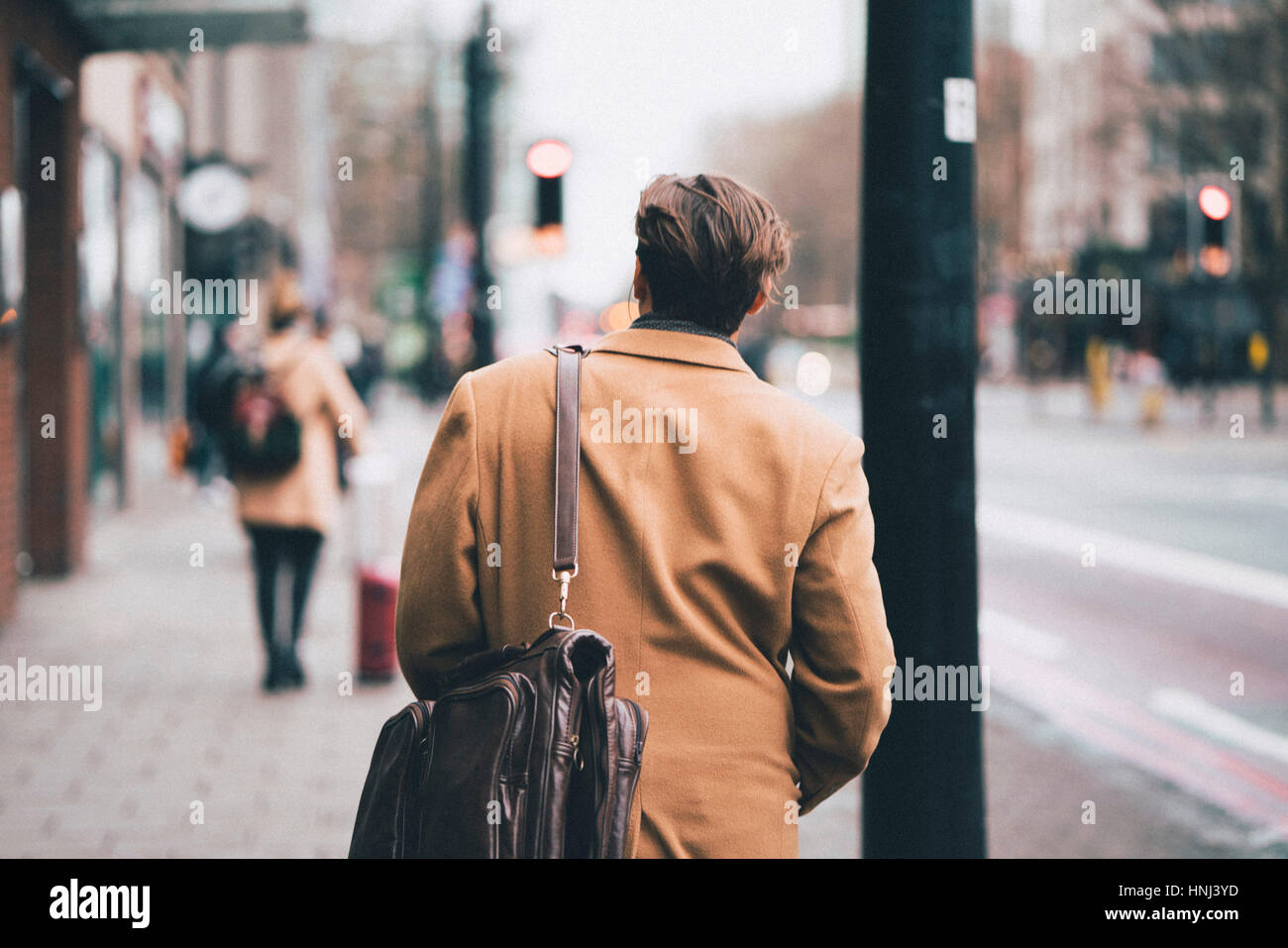 Old man looking over shoulder hi-res stock photography and images - Alamy