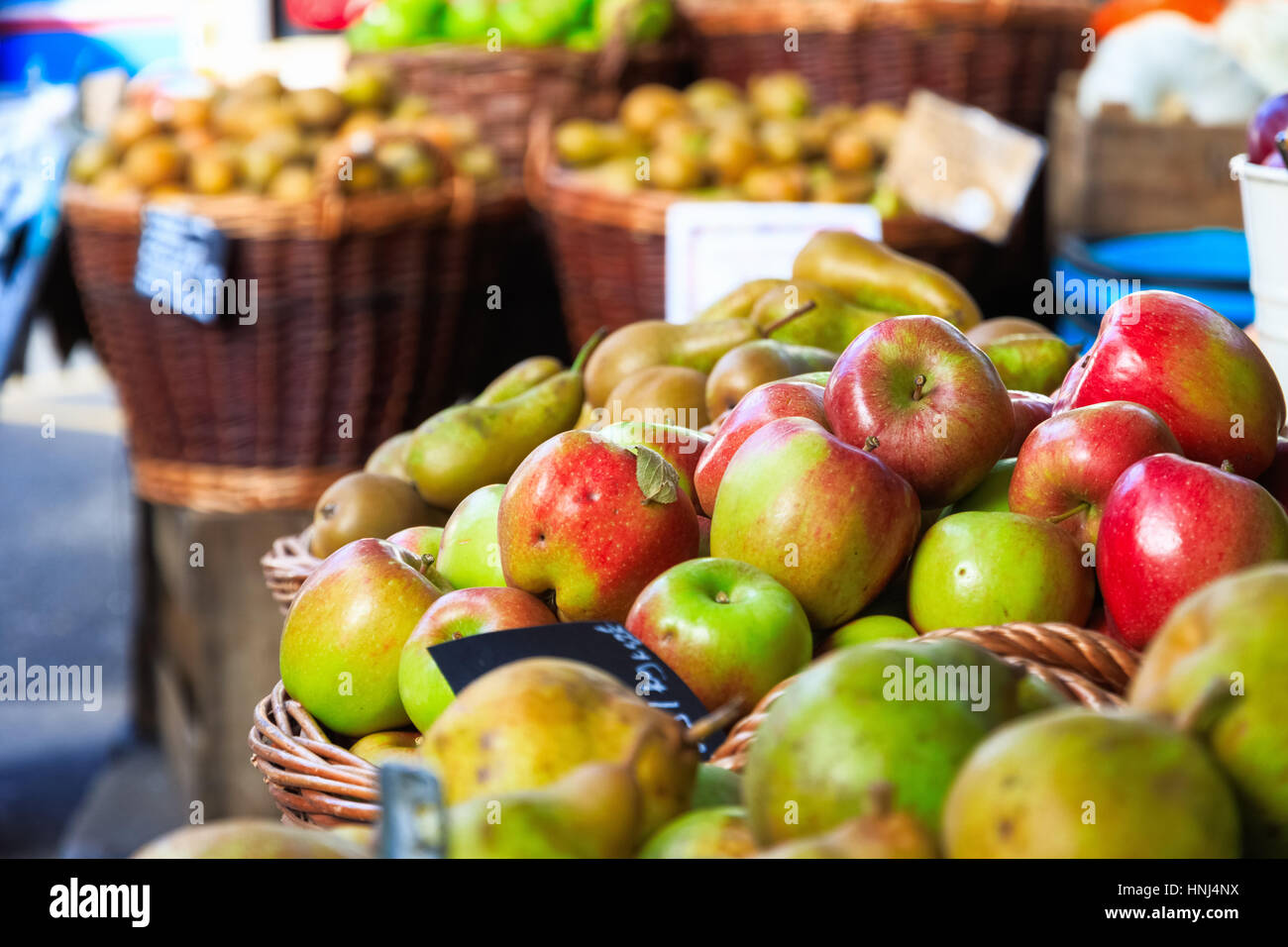 Fresh apples on display at a fruit stand of Borough Market in London ...