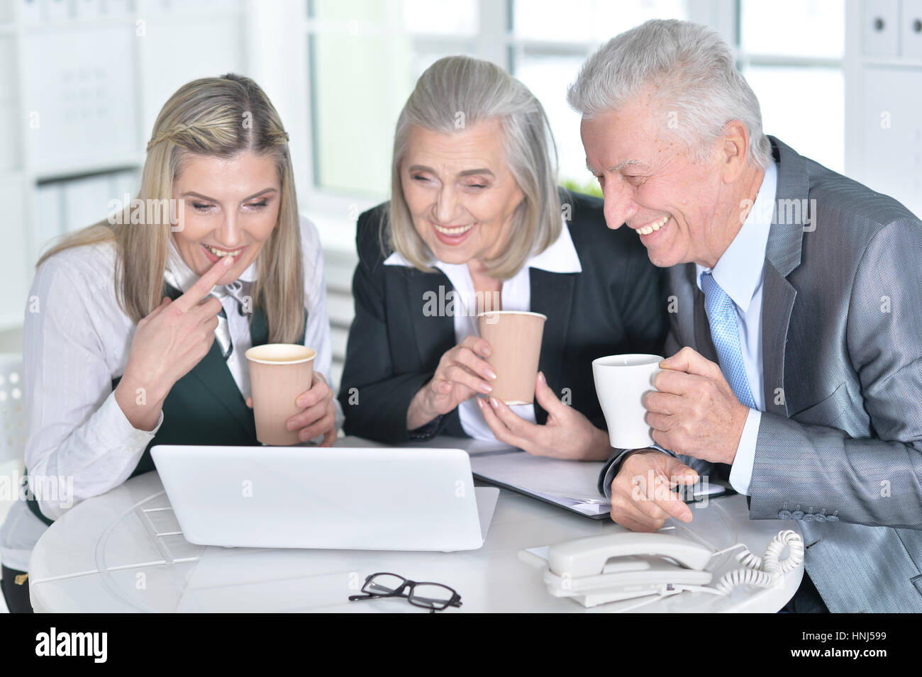 businesspeople using laptop Stock Photo - Alamy businesspeople using laptop Stock Photo - Alamy