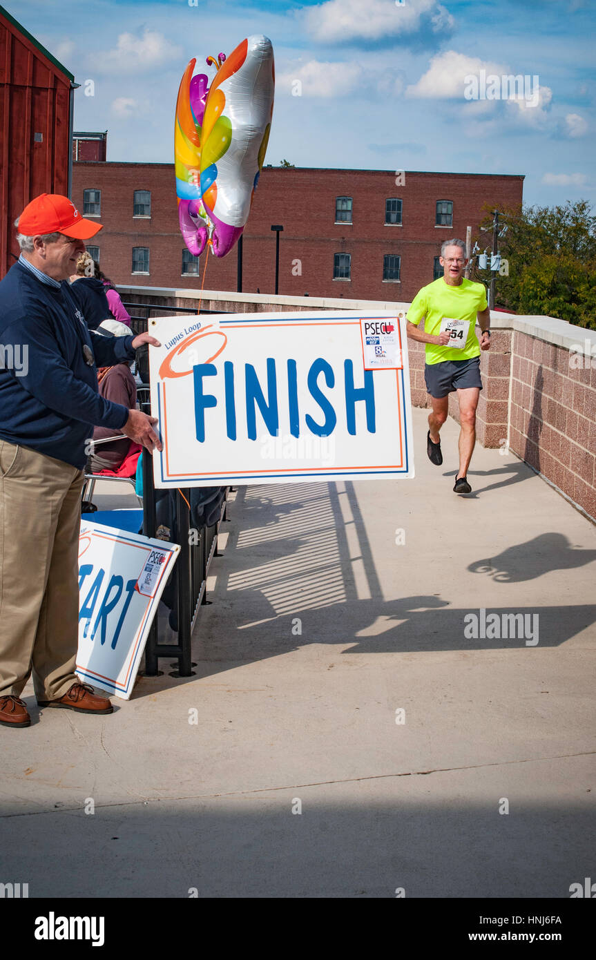 Finish line local Lupus fund raising race Stock Photo - Alamy
