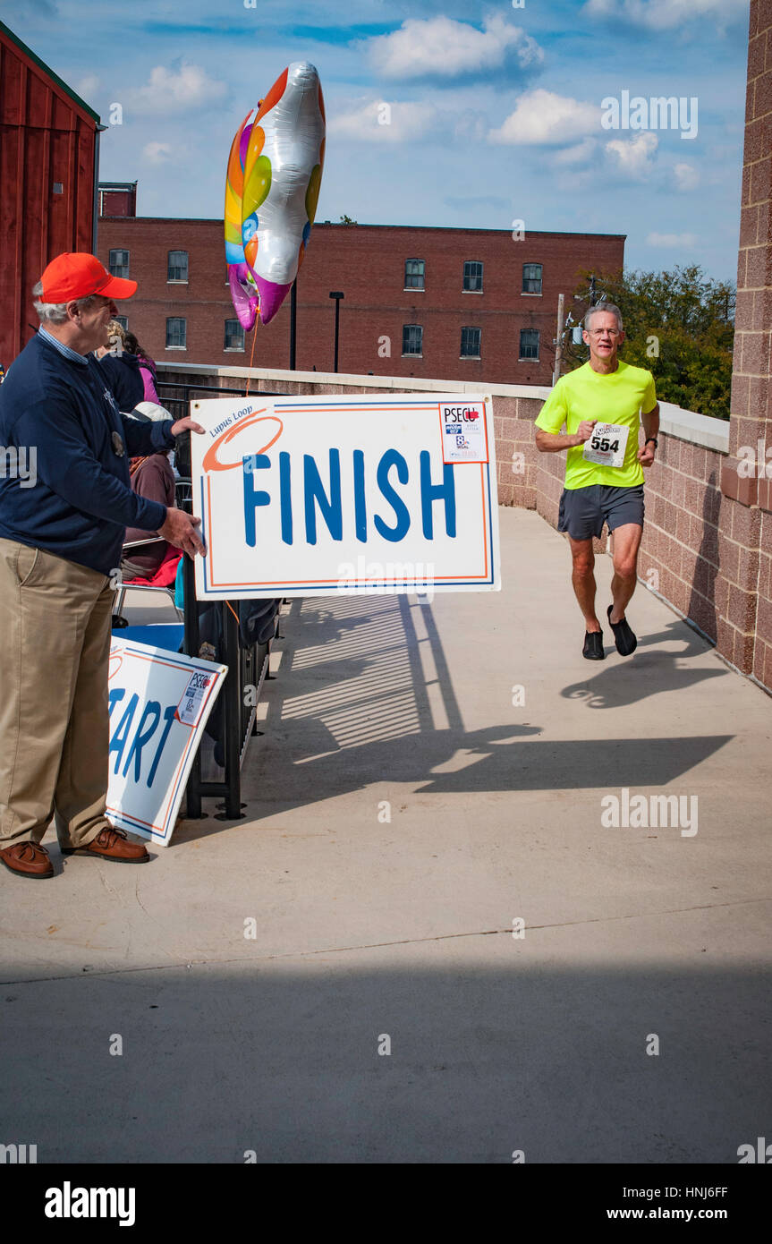Finish line local Lupus fund raising race Stock Photo - Alamy
