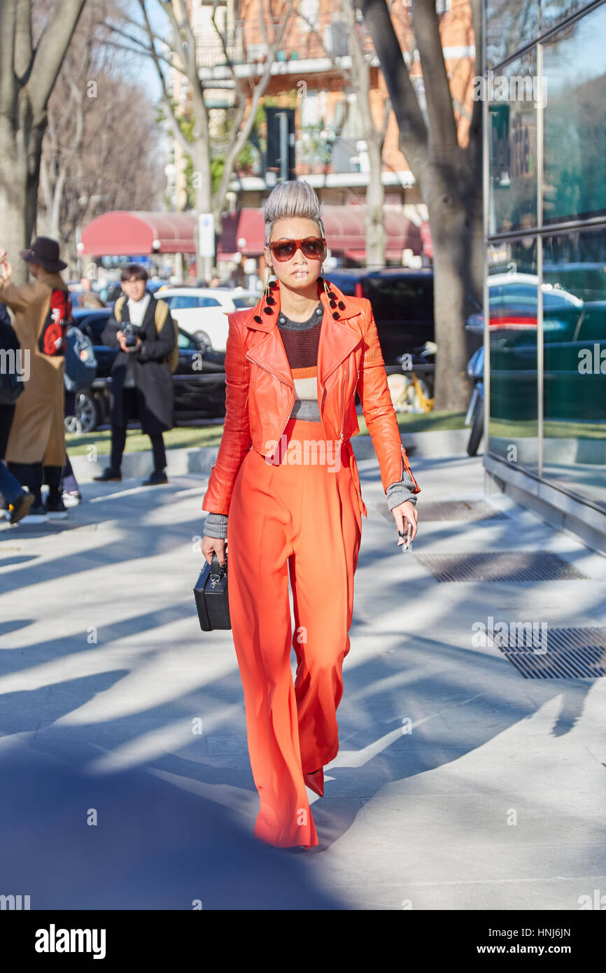 Esther Quek walking before Giorgio Armani fashion show, Milan Fashion ...