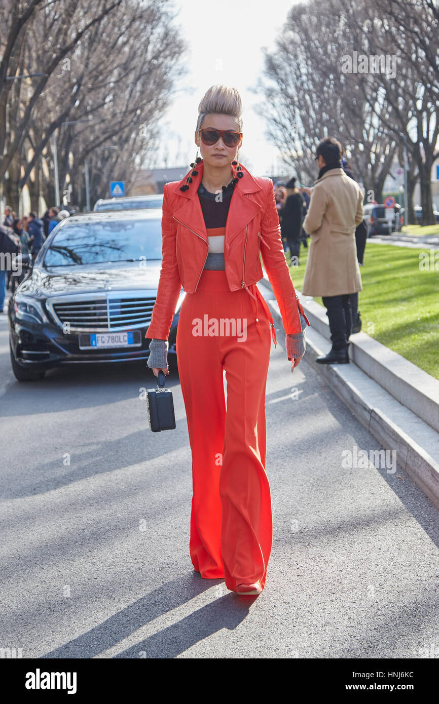 Esther Quek walking before Giorgio Armani fashion show, Milan Fashion ...