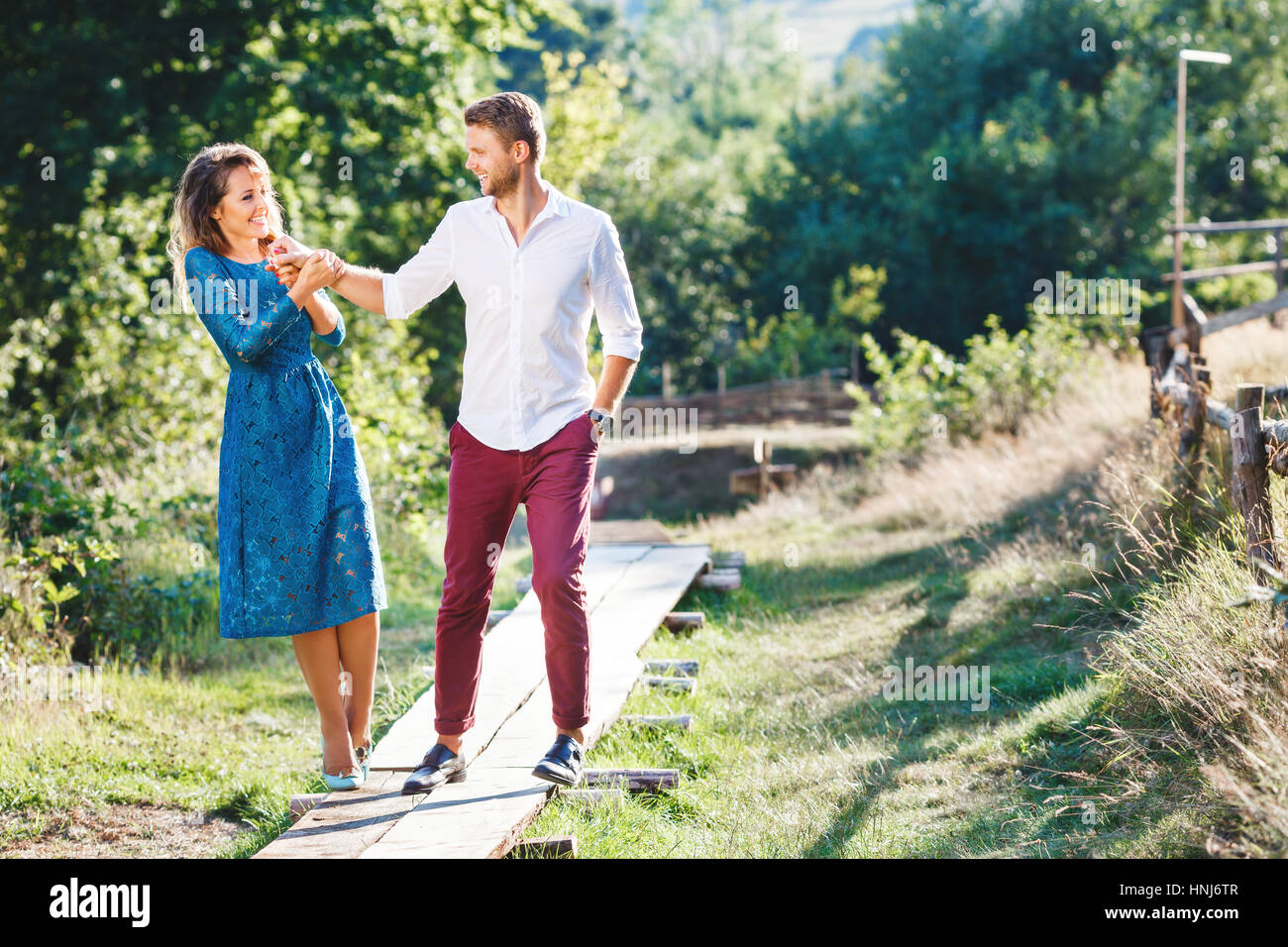 Lovely couple having fun in the countryside Stock Photo - Alamy