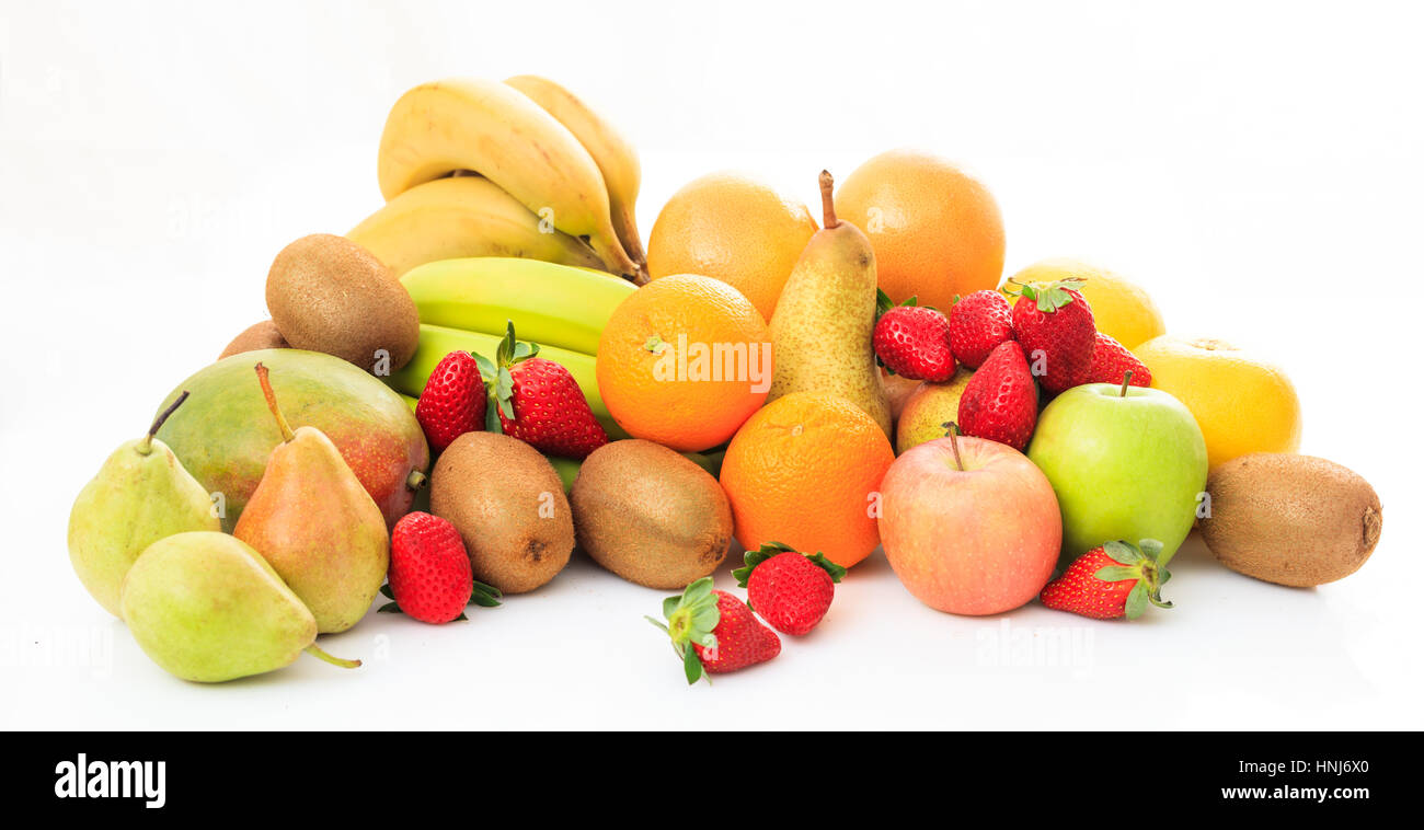 Variety of fresh fruits on white background Stock Photo - Alamy