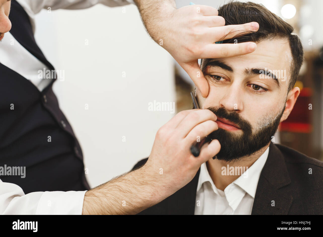 Man's hands making a beard Stock Photo - Alamy