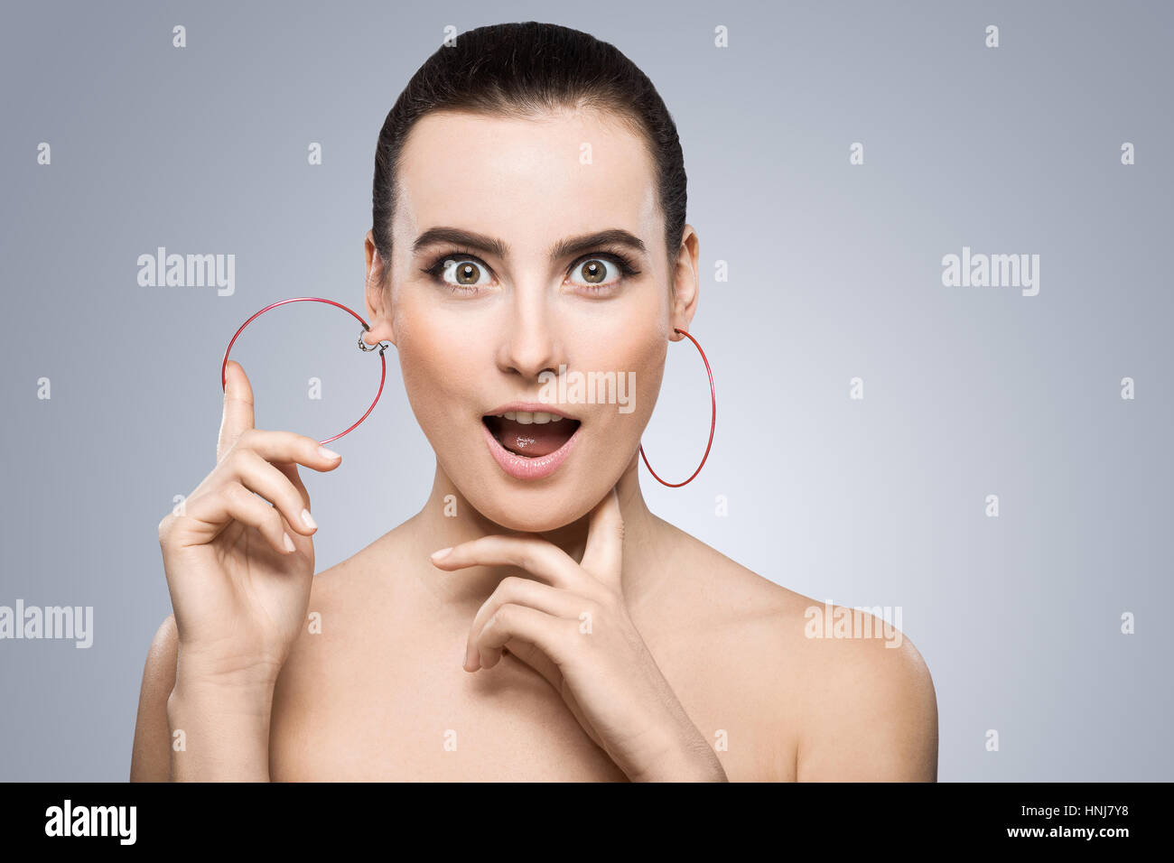 Bizarre earrings hi-res stock photography and images - Alamy