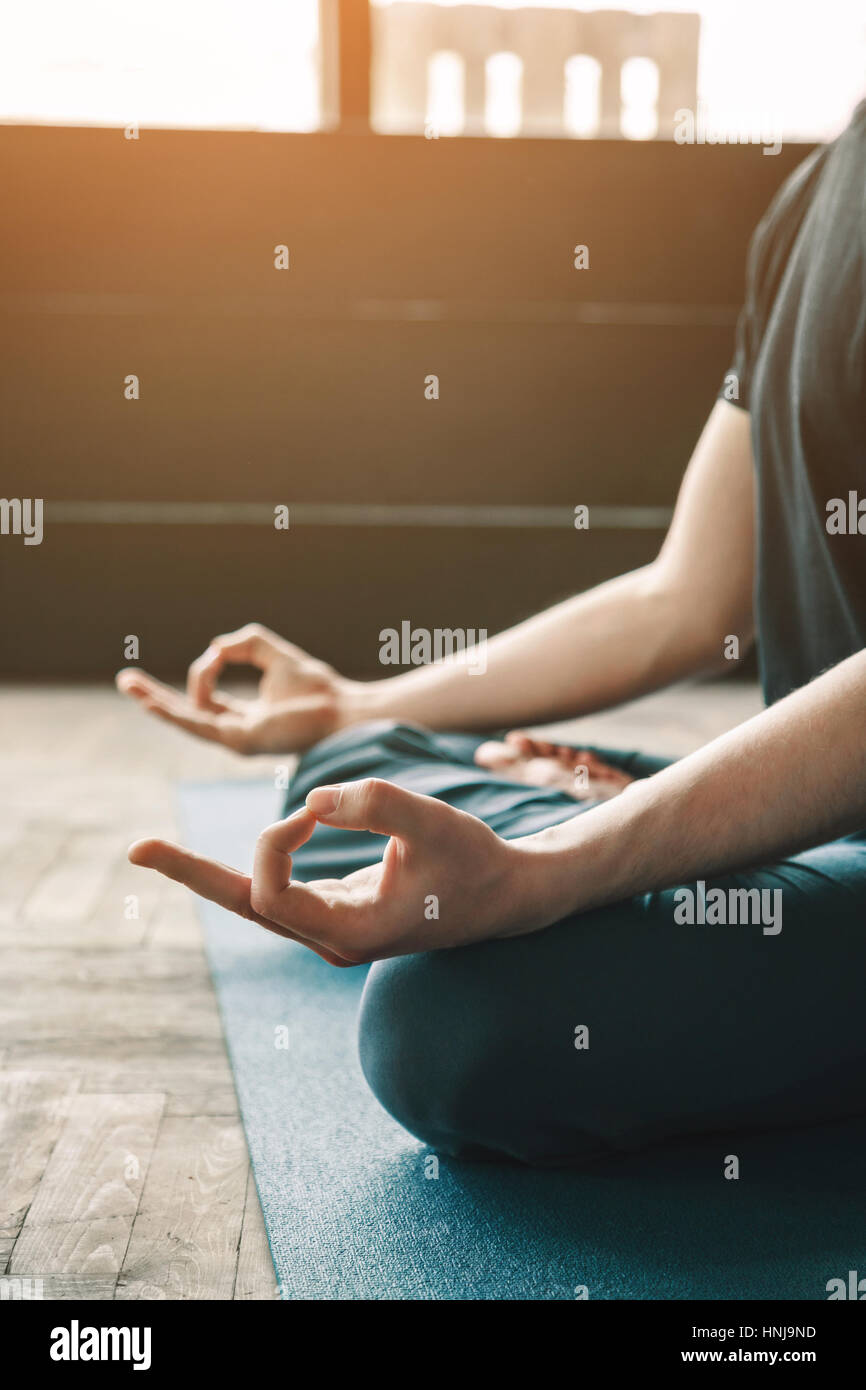 Man practice yoga Stock Photo - Alamy
