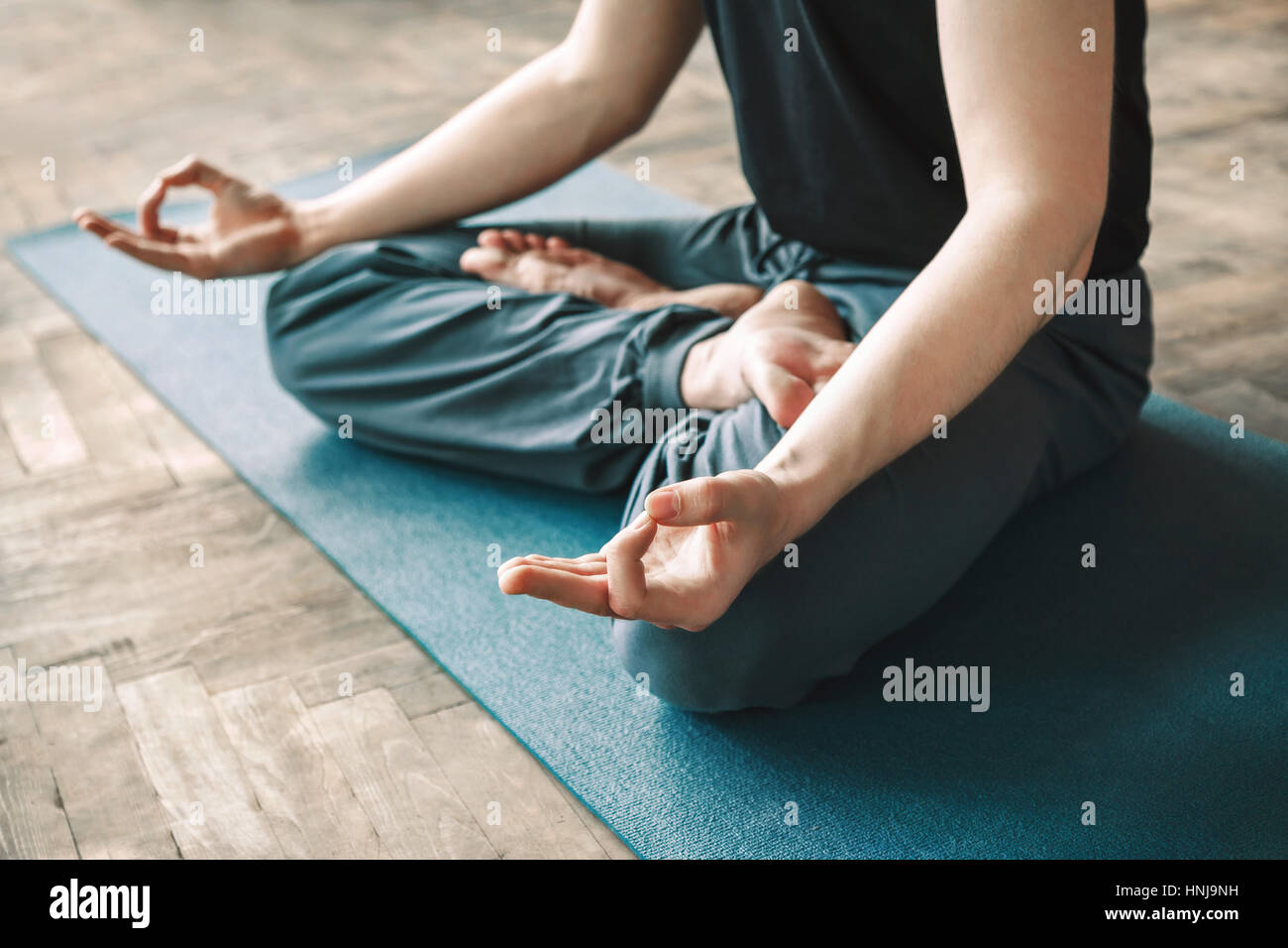 Man practice yoga Stock Photo - Alamy