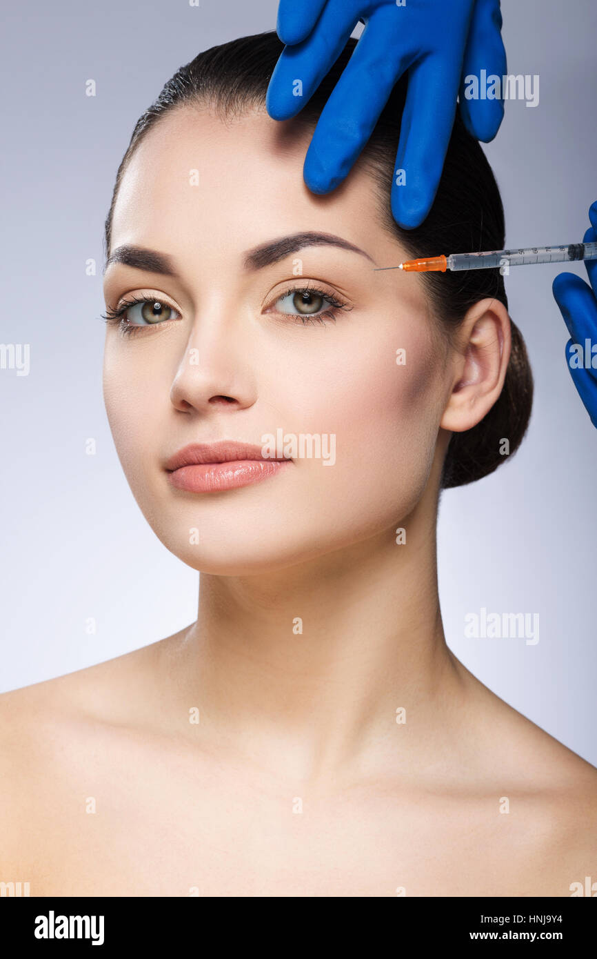 Young lady having beauty injection Stock Photo - Alamy